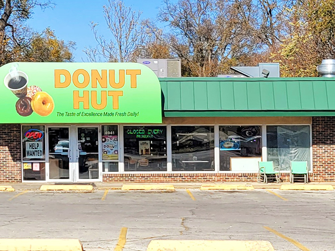 The unmistakable green awning of Donut Hut stands as a beacon of breakfast bliss in Des Moines, promising sweet salvation to early risers and sugar enthusiasts alike.