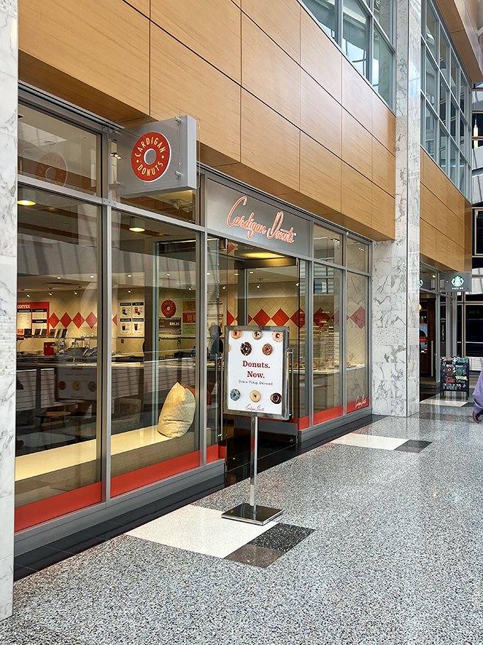 The sleek storefront of Cardigan Donuts beckons from Minneapolis' City Center, promising sweet salvation from Minnesota's notorious winters.