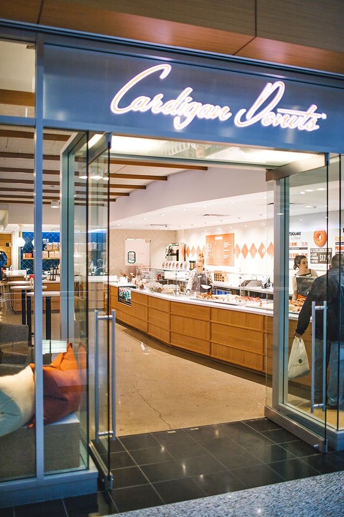 The sleek storefront of Cardigan Donuts beckons from Minneapolis' City Center, promising sweet salvation from Minnesota's notorious winters.