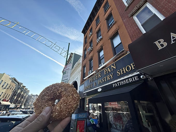 The storefront with gold lettering beckons like a sugar-coated lighthouse on Manhattan Avenue. Donut paradise awaits.