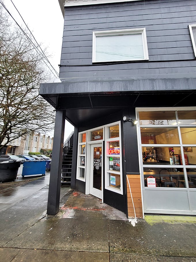 The unassuming blue exterior of Legendary Doughnuts in Tacoma hides a wonderland of fried dough treasures waiting to be discovered.