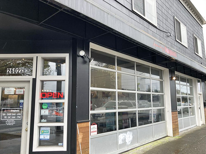 The unassuming blue exterior of Legendary Doughnuts in Tacoma hides a wonderland of fried dough treasures waiting to be discovered.