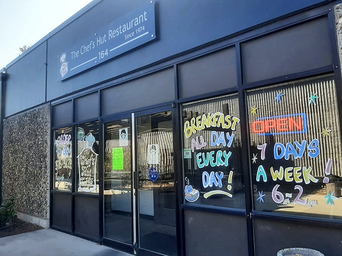 The unassuming blue exterior of The Chef's Hut promises no frills, just honest-to-goodness breakfast mastery that locals have treasured for decades.