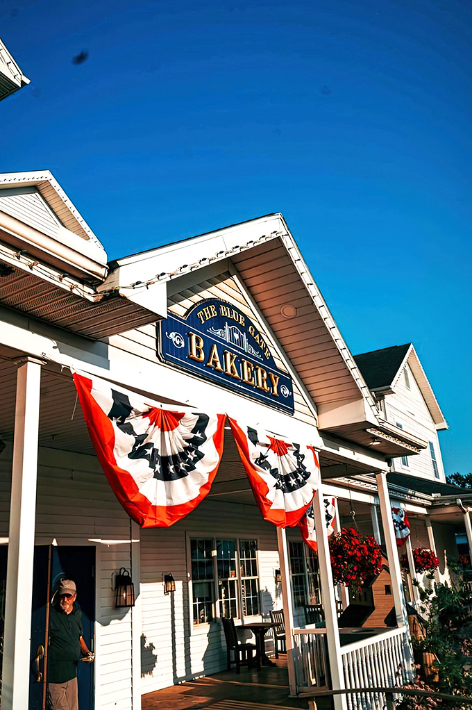A serene koi pond welcomes visitors to Blue Gate, where tranquility begins before you even reach the front door.