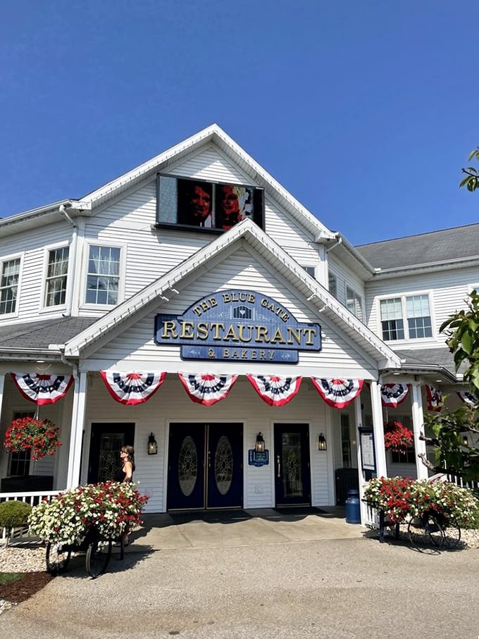 A serene koi pond welcomes visitors to Blue Gate, where tranquility begins before you even reach the front door.