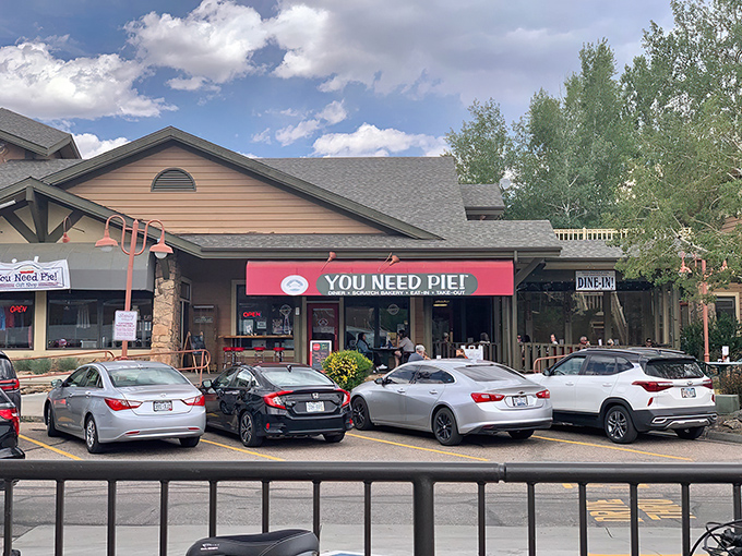 The bright red awning of You Need Pie! Diner isn't just inviting&mdash;it's making a bold statement about your immediate dietary requirements.