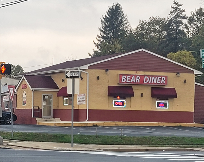 The sunshine-yellow exterior of Bear Diner stands as a cheerful beacon in Delaware, promising comfort food that feels like a warm hug.