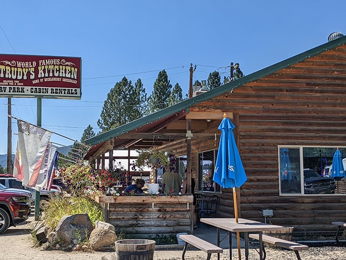 The log cabin exterior of Trudy's Kitchen stands like a delicious mirage in Idaho City, promising comfort food treasures within those timber walls.