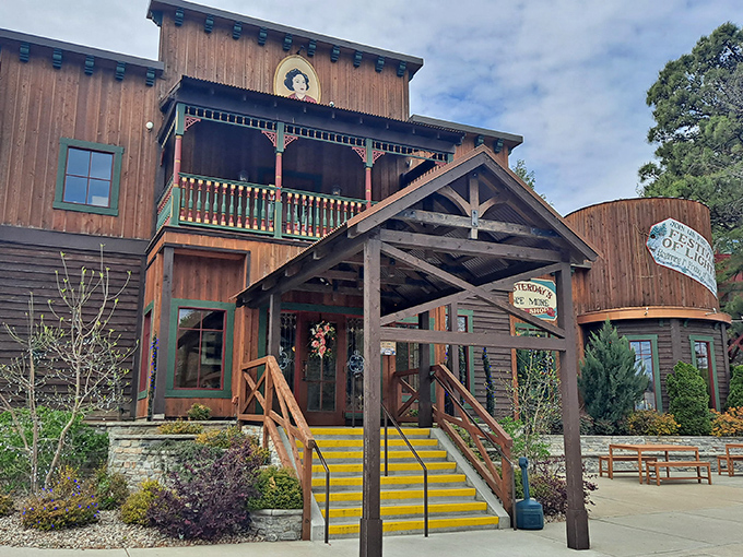 The rustic wooden exterior of Patti's 1880's Settlement welcomes visitors with its charming green trim and distinctive yellow steps&mdash;architectural comfort food for the soul.