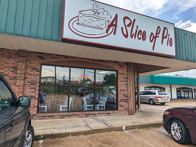 The unassuming exterior of A Slice of Pie stands like a dessert speakeasy, quietly promising treasures that make detours worthwhile. 