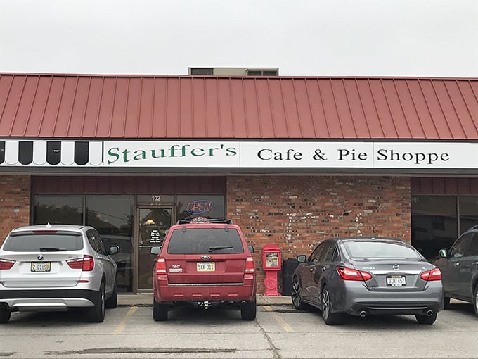 The pilgrimage begins here - a humble red-roofed brick building housing Nebraska's temple to pie perfection. Forget fancy facades; it's what's inside that counts.