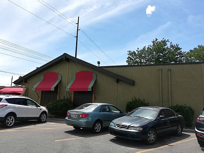 The iconic red awning beckons like a culinary lighthouse, promising comfort food salvation after a long day of Utah adventures.