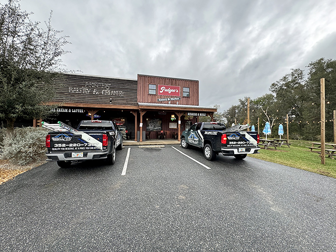 Welcome to Pudgee's, where rustic charm meets culinary delight! This unassuming exterior houses a treasure trove of flavors that'll make your taste buds do a happy dance.