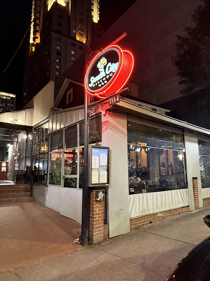The understated exterior belies the culinary treasures within. Palm trees and a classic sign welcome you to this Atlanta institution.