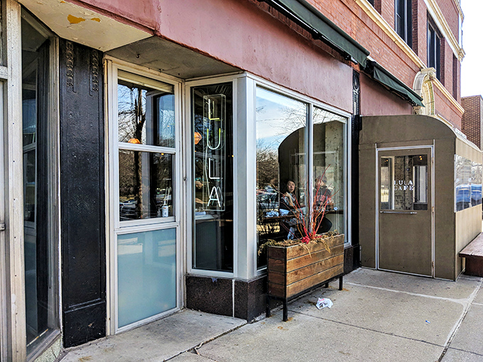 Logan Square's architectural gem houses culinary magic. That ornate entrance and colorful sign promise something special before you even taste a bite.