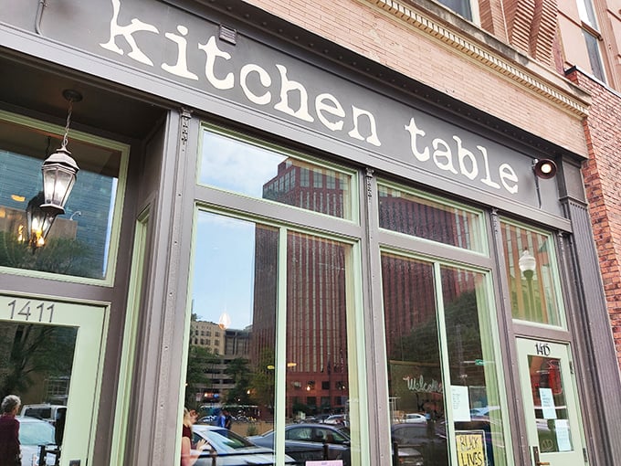 The unassuming storefront belies the culinary treasures within. Like finding a secret jazz club, Kitchen Table's exterior promises those in-the-know something special awaits. 