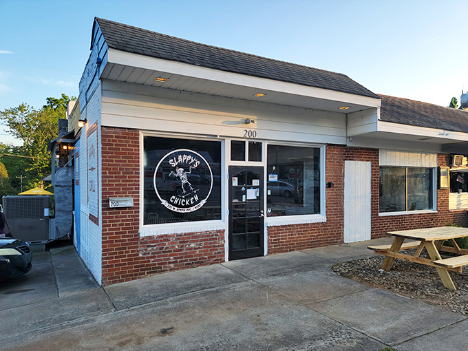 The unassuming brick storefront houses culinary treasures that locals whisper about. That dancing skeleton logo? A hint at the life-changing experience awaiting inside. 
