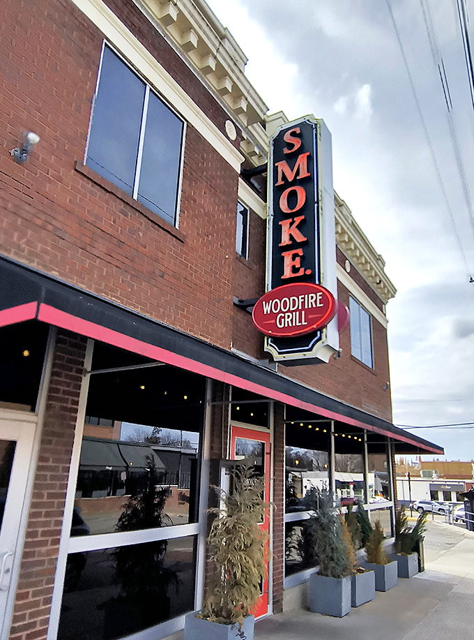 Brick and mortar never looked so inviting! SMOKE.'s exterior is like a siren call to hungry souls, with its vintage sign and cheery red door beckoning you inside.