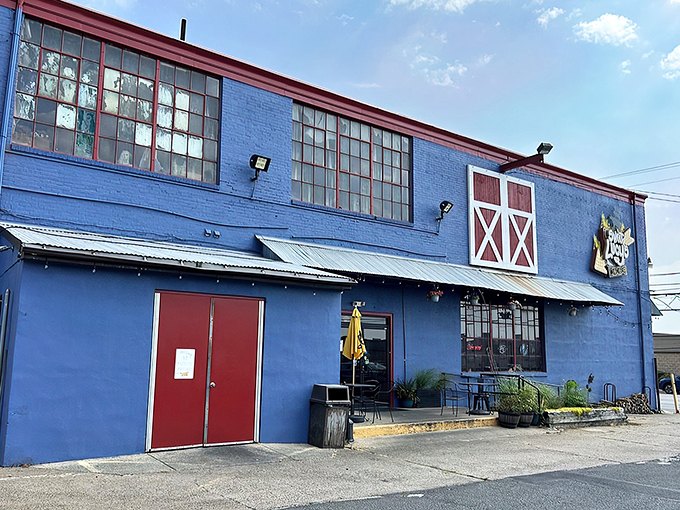 The bright blue exterior of Sweet Lucy's stands out like a barbecue beacon in Northeast Philly, promising smoky treasures within those barn-like walls. 