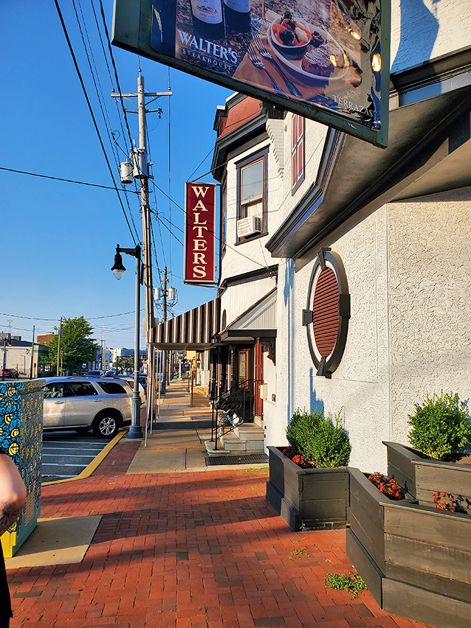 The iconic vertical WALTER'S sign has guided hungry Wilmington locals to steak paradise since 1993. A humble exterior that promises extraordinary flavors within.