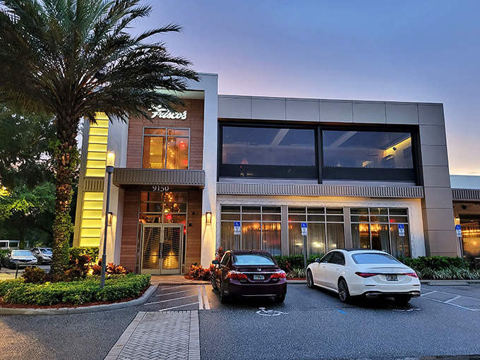 The understated exterior of Del Frisco's belies the carnivorous cathedral waiting inside. Like finding a Rolex in a paper bag.