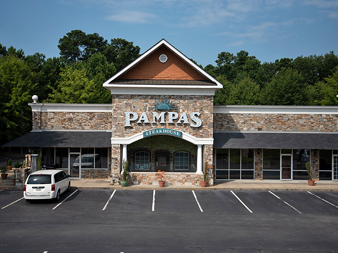 The stone facade of Pampas stands like a carnivore's cathedral in Johns Creek, promising meaty salvation within those unassuming walls.