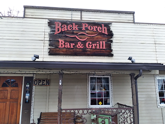 The iconic red fa&ccedil;ade of Back Porch Bar & Grill stands proudly against Jacksonville's blue skies, like a culinary lighthouse beckoning hungry travelers home.