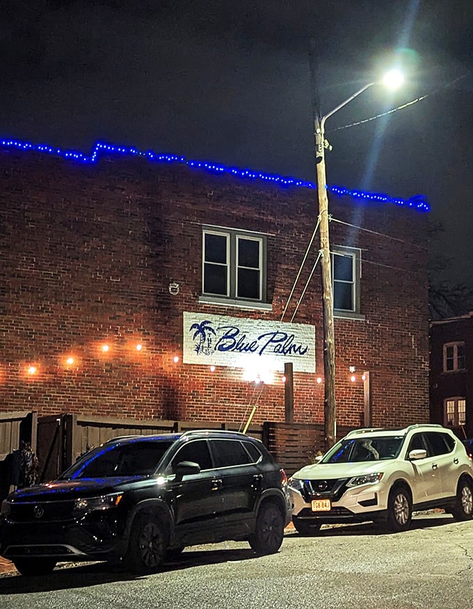 From the outside, The Blue Palm plays it cool &ndash; a modest brick building that keeps its tropical treasures hidden like a speakeasy with sunscreen.