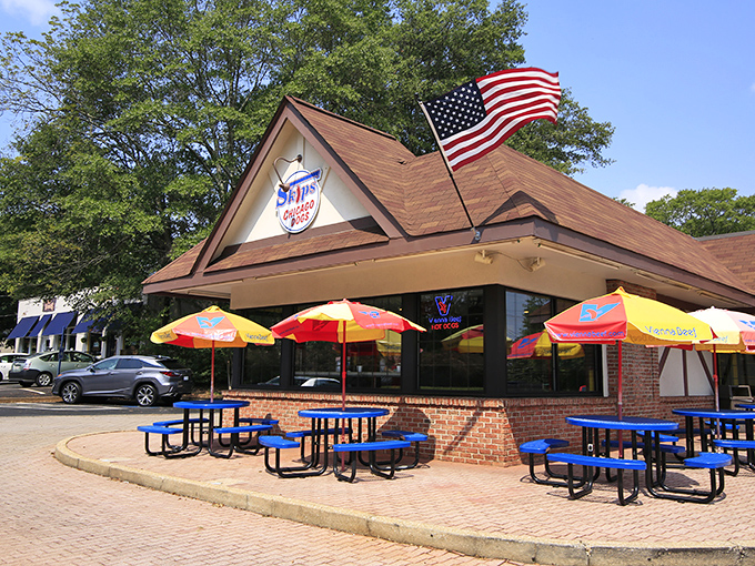 The Tudor-style exterior of Skip's Chicago Dogs stands as a welcoming beacon of Midwest flavor in the heart of Avondale Estates.