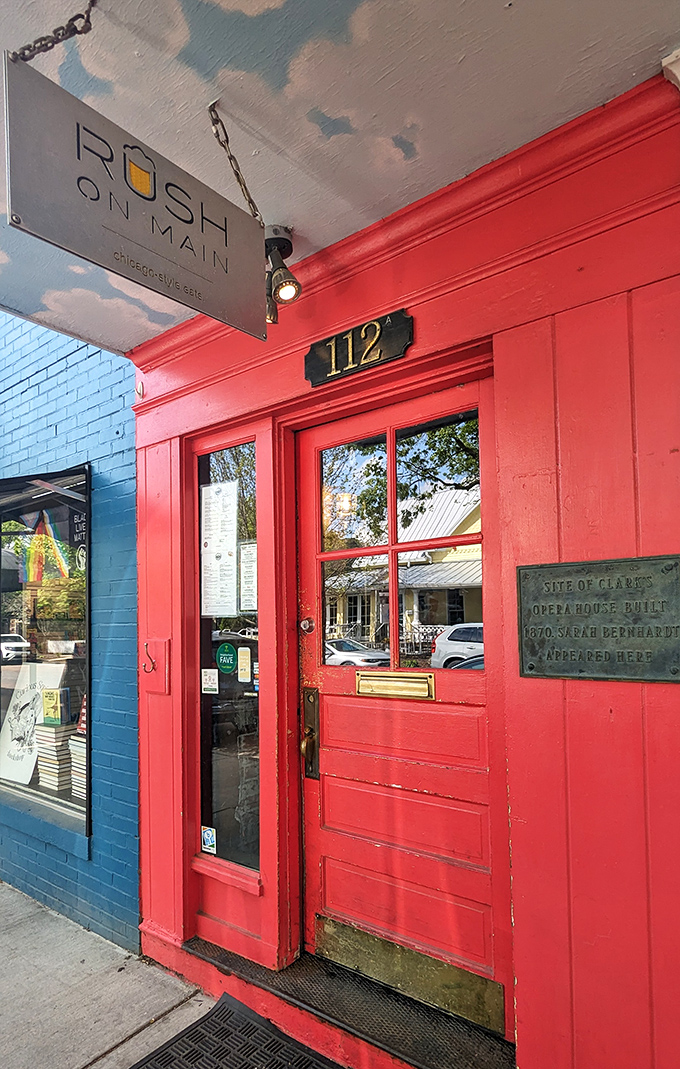 The bright red door at Rush on Main stands out like a beacon on Zionsville's Main Street, promising Chicago-style delights within these historic walls.
