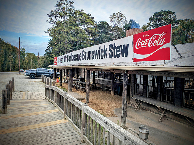 The humble exterior of Fresh Air BBQ stands as a testament that greatness doesn't need fancy packaging&mdash;just smoke, tradition, and a gravel parking lot.