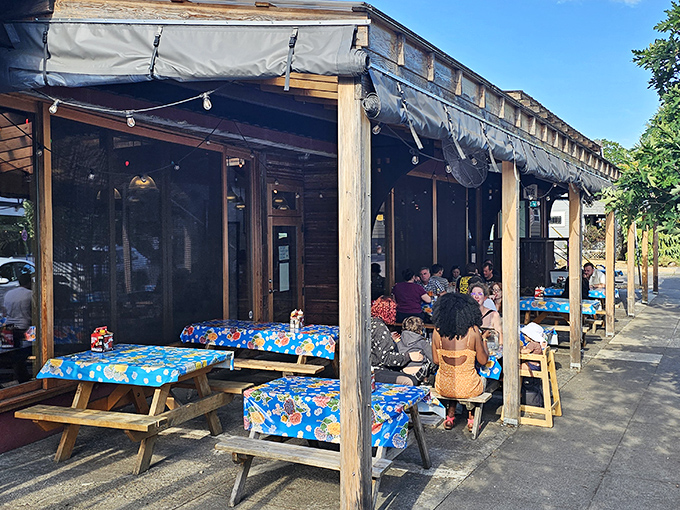The entrance to barbecue nirvana, flanked by wood cages that aren't just decoration&mdash;they're the secret behind that intoxicating smoke aroma wafting through the neighborhood. 