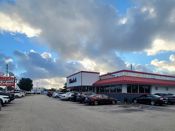 Lester's iconic red and white exterior stands like a beacon of breakfast hope on State Road 84, promising comfort food salvation since 1967.