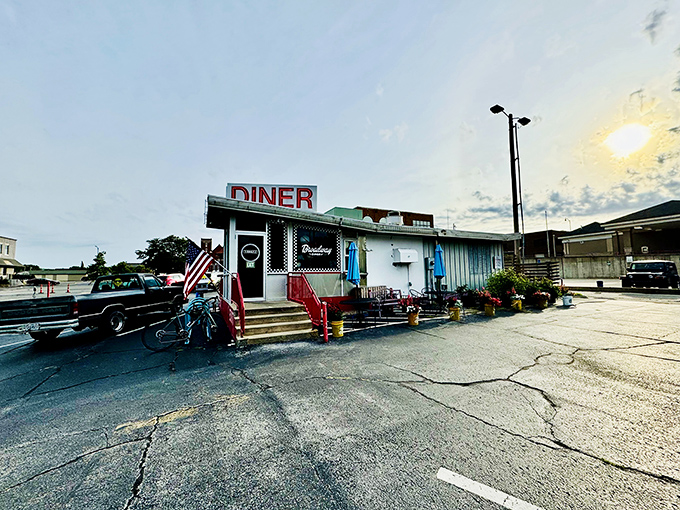 The iconic exterior of Broadway Diner beckons with its retro charm and unmistakable red "DINER" sign—a Columbia landmark where breakfast dreams come true.
