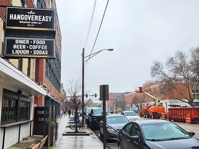 The bright red door and sunny yellow windows of Hang Over Easy beckon like a breakfast lighthouse on Neil Avenue, promising salvation for hungry souls.