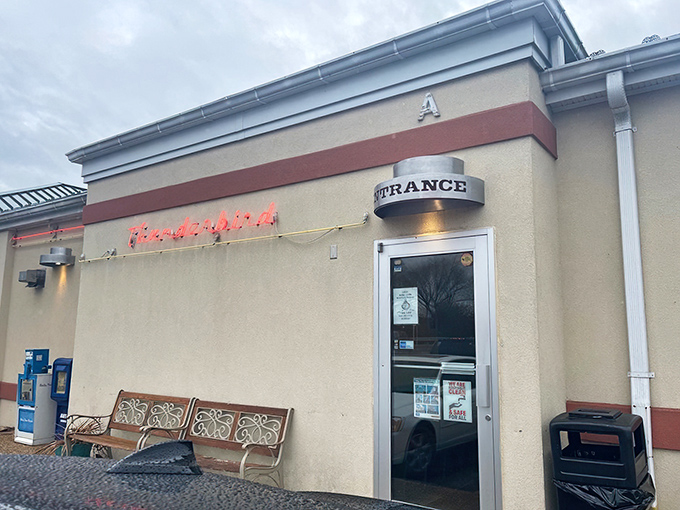 The unassuming exterior of Thunderbird Cafe stands like a beacon of breakfast hope, its neon sign promising delicious revelations within.