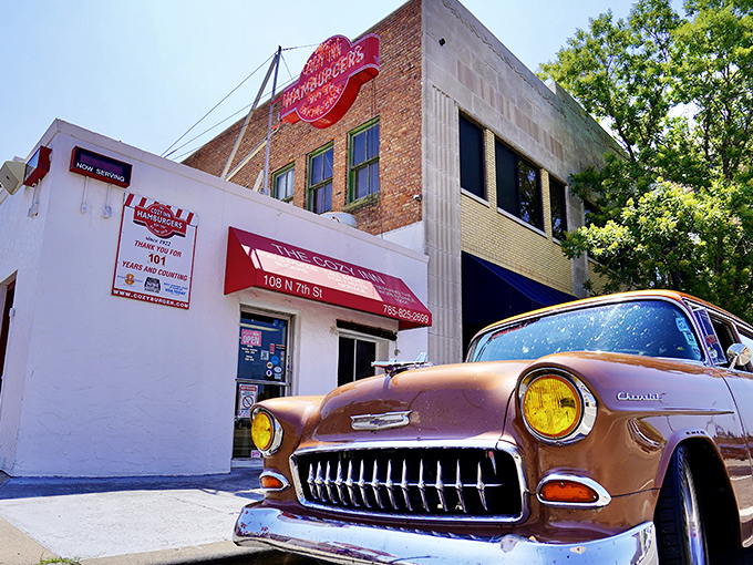 The unassuming white exterior of Cozy Inn belies its legendary status. Like finding a Picasso at a yard sale, this humble building houses burger greatness.