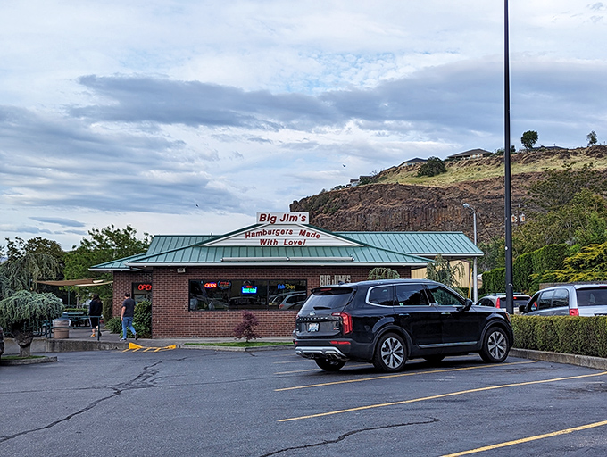 The unassuming brick exterior of Big Jim's hides a burger paradise within, like finding the Hope Diamond at a yard sale.