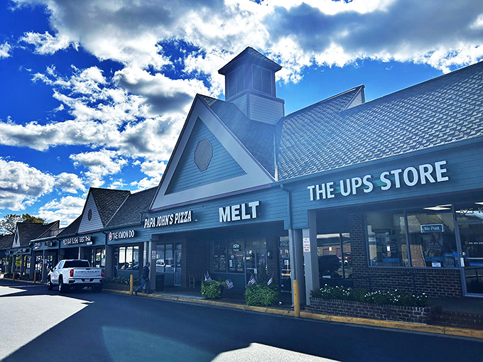 Hiding in plain sight between Papa John's and a UPS Store, this unassuming strip mall treasure proves that culinary greatness doesn't need fancy digs.