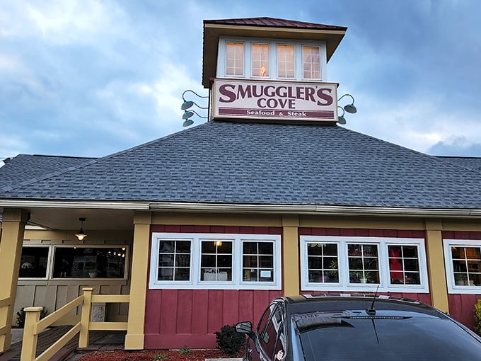 The maritime beacon of the Poconos, Smuggler's Cove stands proudly with its distinctive cupola and welcoming wooden deck, like a culinary lighthouse guiding hungry travelers home.