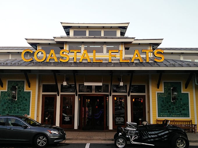 The sunshine-yellow exterior of Coastal Flats stands out in Fairfax like a beach house that took a wrong turn at Virginia Beach and decided to stay.
