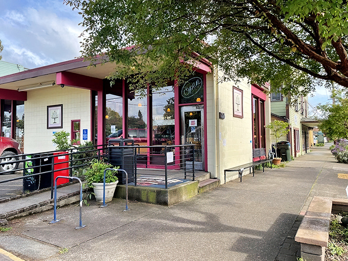 The pale yellow and pink-trimmed fa&ccedil;ade isn't just a storefront&mdash;it's a portal to butter-based happiness in Eugene's culinary landscape. 