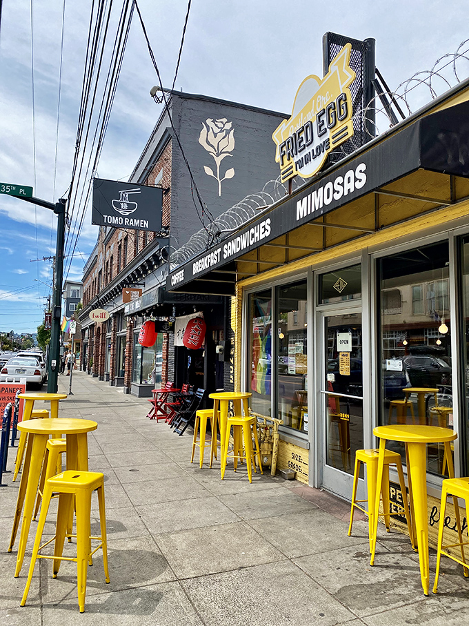 The bright yellow guitar-shaped egg sign beckons breakfast enthusiasts like a rock concert for your taste buds. Portland's breakfast scene at its finest.