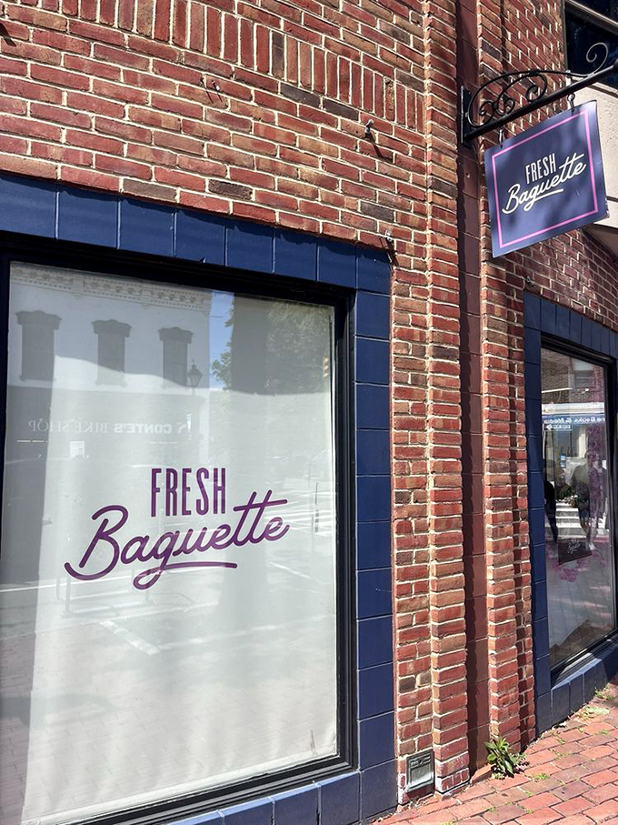 Fresh Baguette's charming brick exterior with blue trim feels like stumbling upon a secret Parisian caf&eacute; tucked away in Alexandria's historic streets.