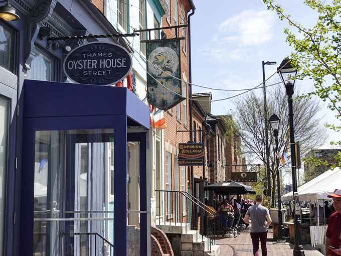 The unassuming blue storefront of Thames Street Oyster House stands like a culinary lighthouse in Fells Point, beckoning seafood lovers from miles around.