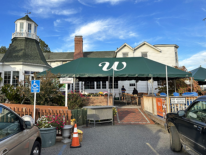 The iconic lighthouse cupola of The Wellwood isn't guiding ships&mdash;it's beckoning hungry travelers to a seafood sanctuary where history meets hospitality.