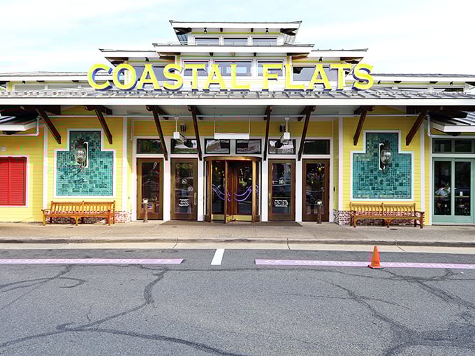 The sunshine-yellow exterior of Coastal Flats stands out in Fairfax like a beach house that took a wrong turn at Virginia Beach and decided to stay.