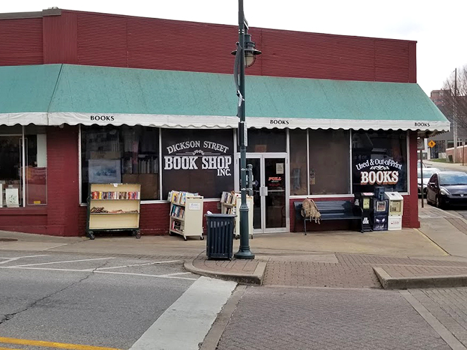 The brick-red exterior with its cheerful blue awning beckons bibliophiles like a literary lighthouse on Fayetteville's Dickson Street. This isn't just a store&mdash;it's a destination.