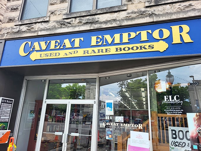 The royal blue storefront of Caveat Emptor beckons like a literary siren song. Latin for "buyer beware," but the only danger here is losing track of time.