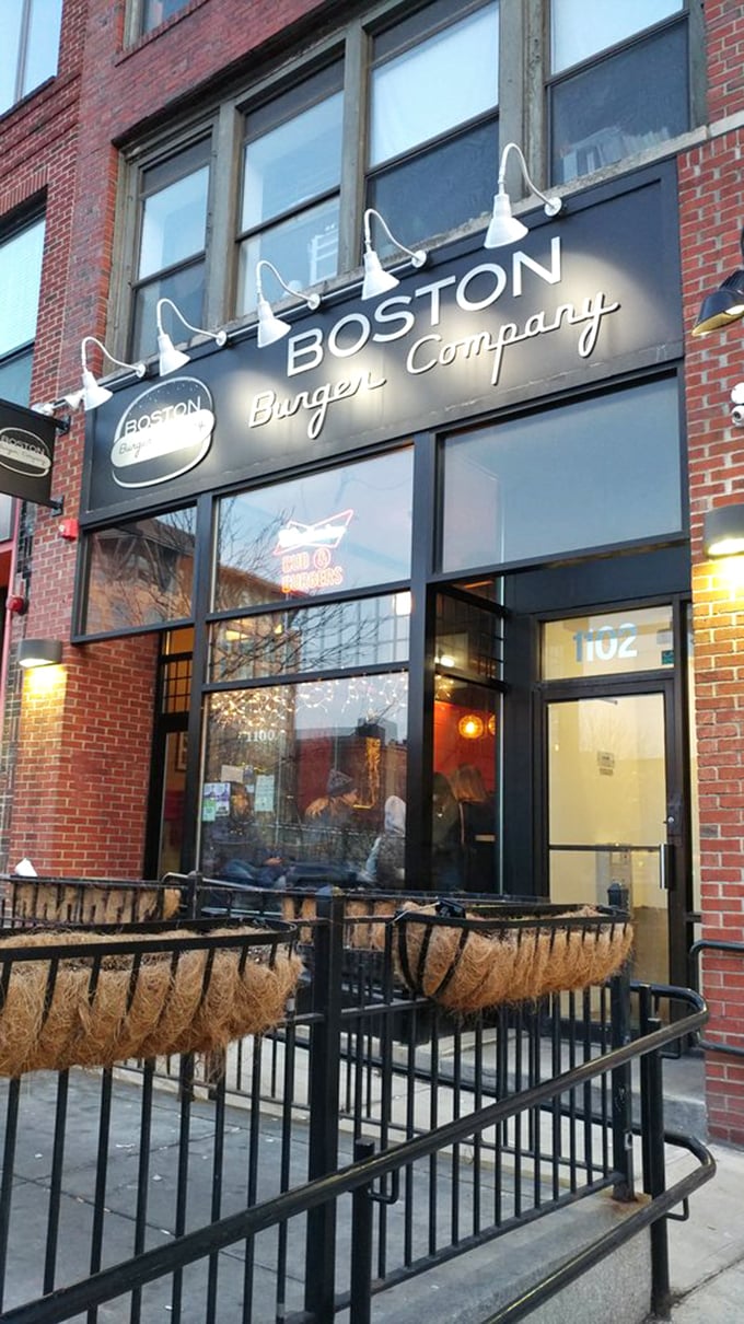 The brick-front gateway to burger paradise, where locals line up for towering creations that require both strategy and napkins.